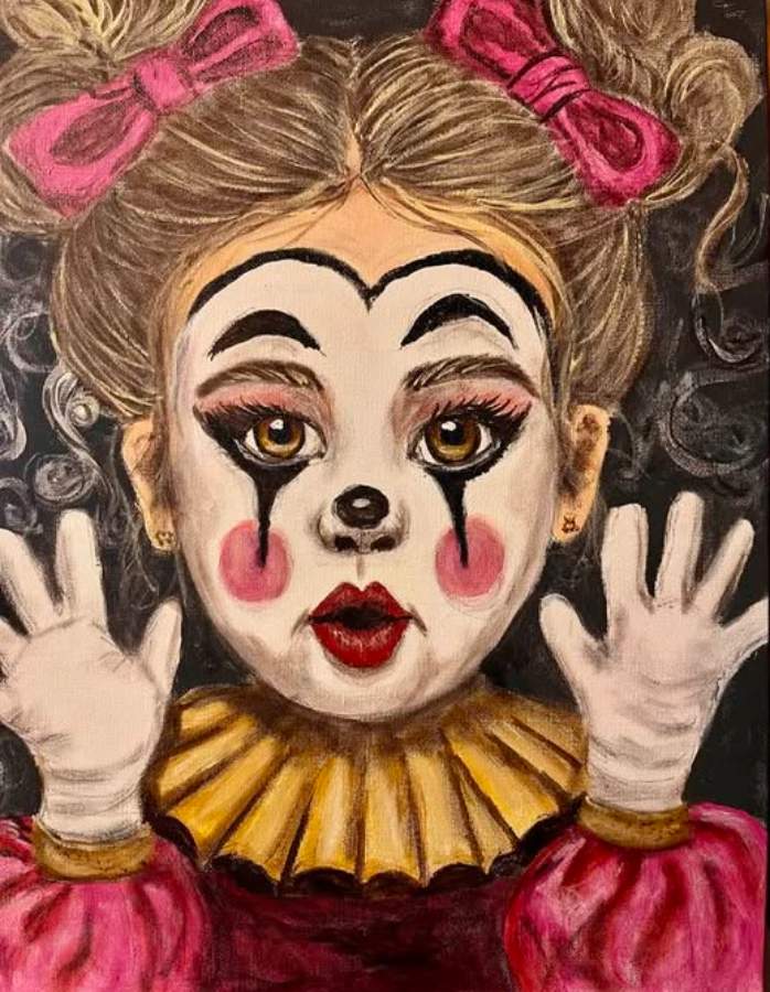 A little clown/harleguin!